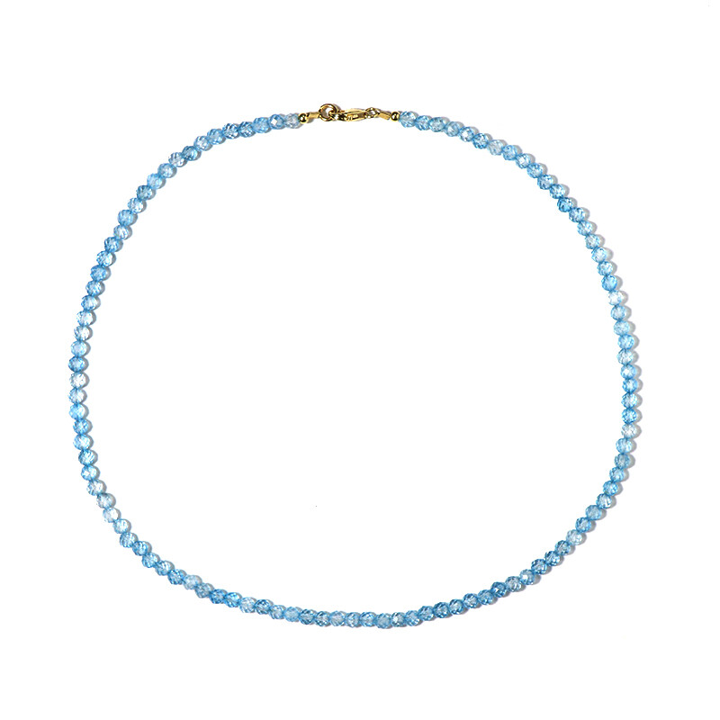 Collana in argento placcato oro con topazio blu cielo